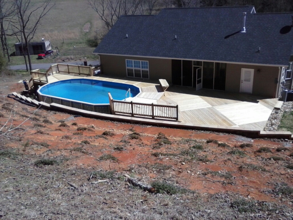 Deck around a swimming pool built by The Deck Builder in Townsend TN ...